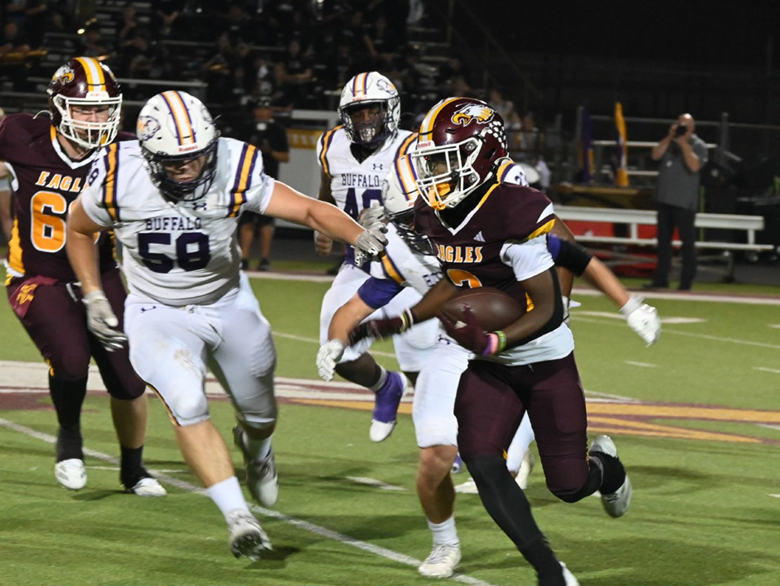 Eagles Ease Past Bison 63-21